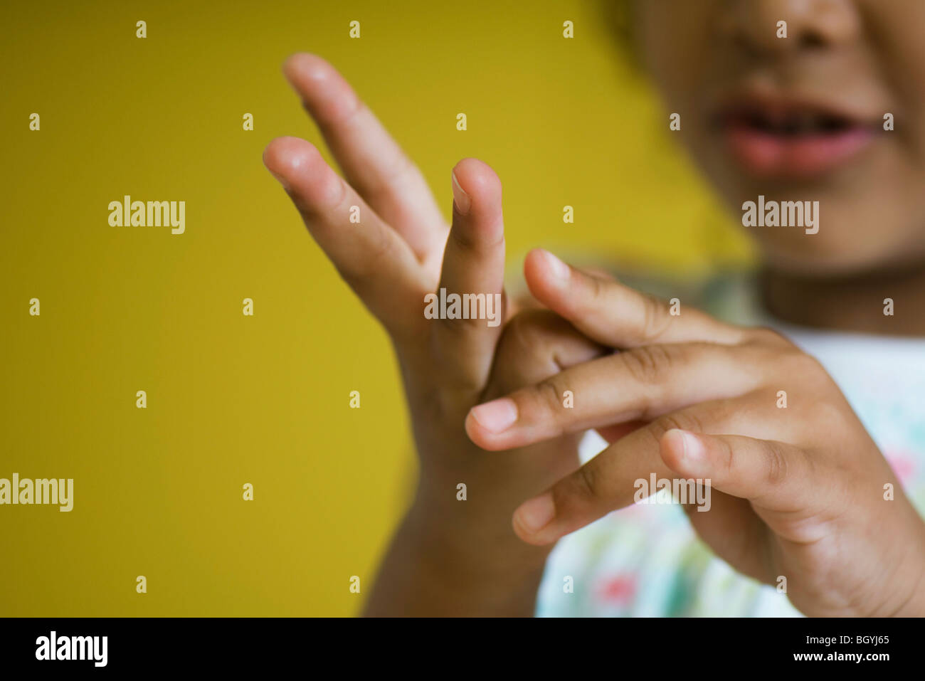 Little girl counting fingers, cropped Stock Photo - Alamy