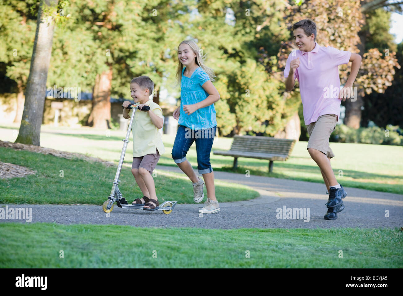 Children running on path Stock Photo - Alamy