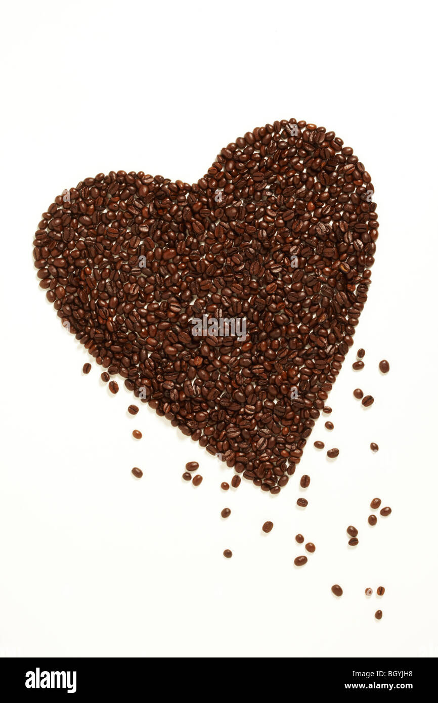 Coffee Beans Foaming a Heart Shape Symbolizing Love Stock Photo - Alamy
