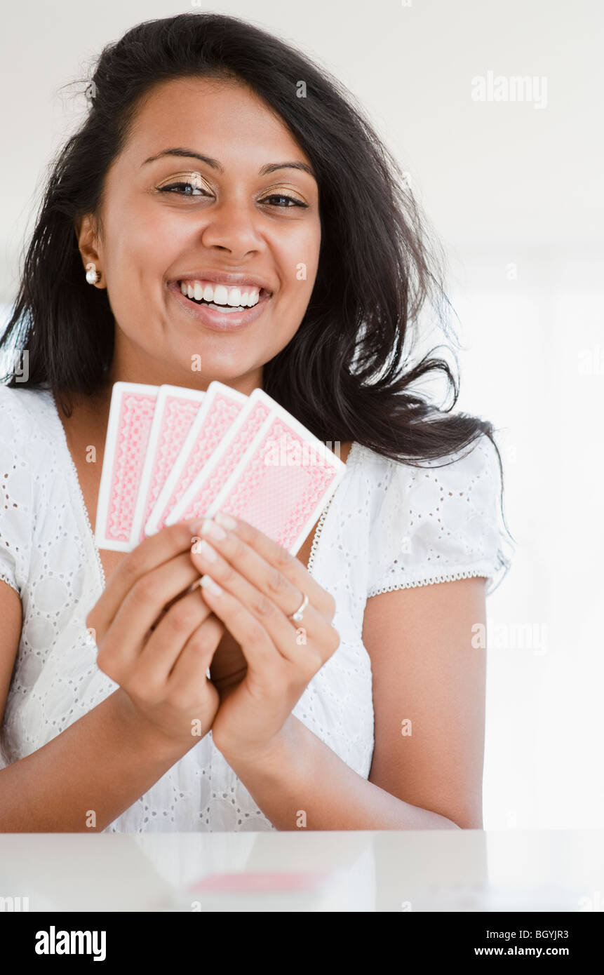 Woman playing cards Stock Photo - Alamy