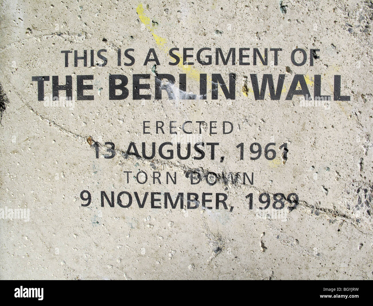 caption on a large section of the Berlin Wall erected as a display ...