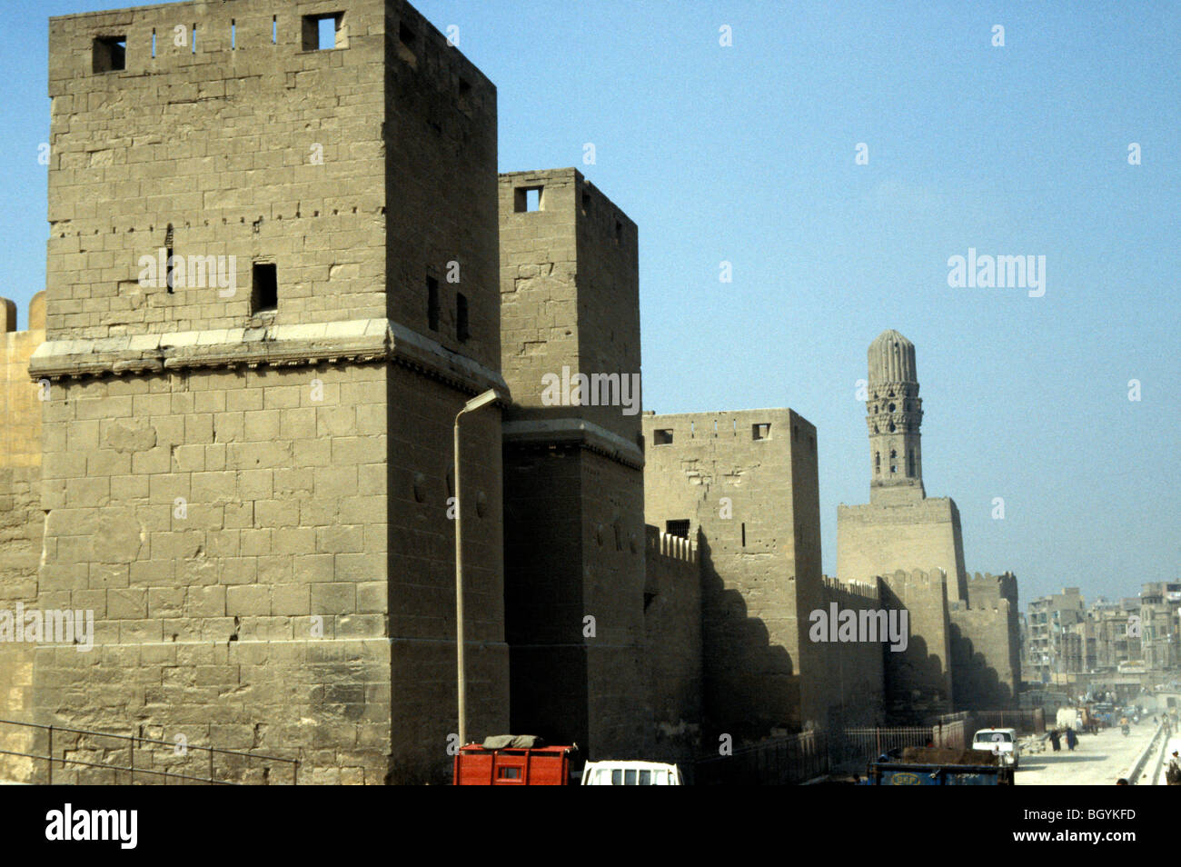 Fatimid walls surrounding Cairo Egypt with a minaret of the Hakim ...
