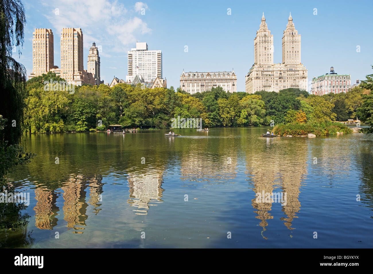 Tall buildings reflected in the ocean hi-res stock photography and ...