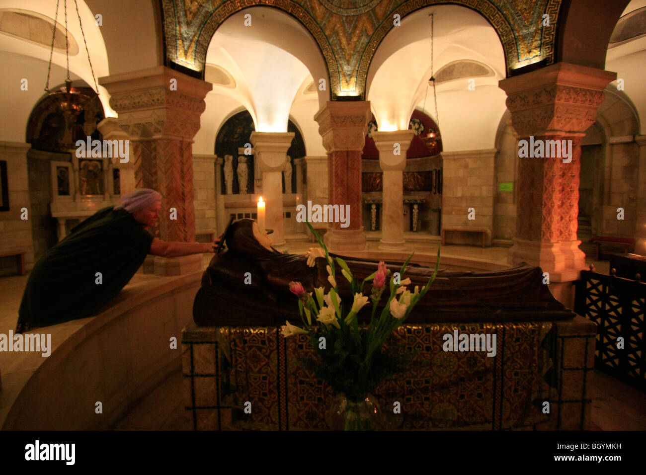 Israel, Jerusalem, a pilgrim by the statue of Mary in eternal sleep on ...