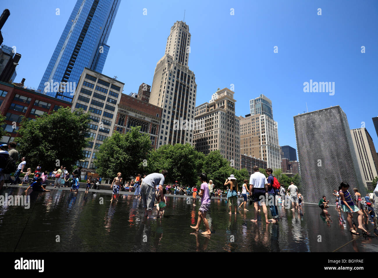 All generations of people playing in spouting water at the Crown ...