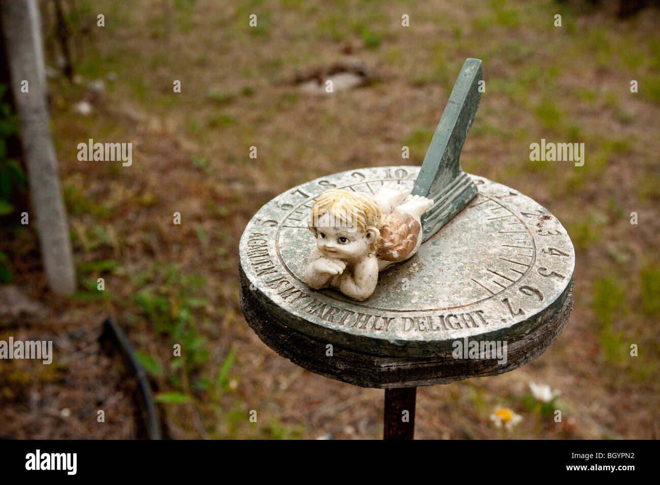 Cherub Sun Dial Stock Photo - Alamy