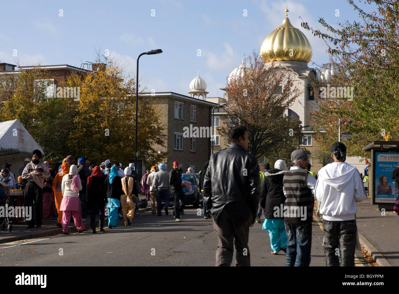 Sikh Nagar Kirtan celebration outside the Gurdwara Sri Guru Singh Sabha ...