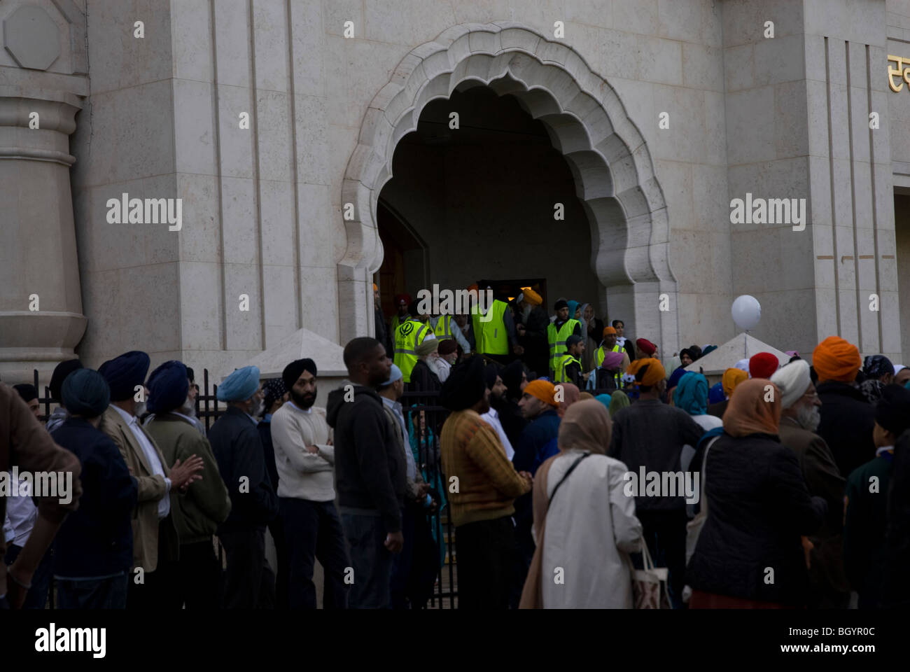 Sikh Nagar Kirtan celebration outside the Gurdwara Sri Guru Singh Sabha ...