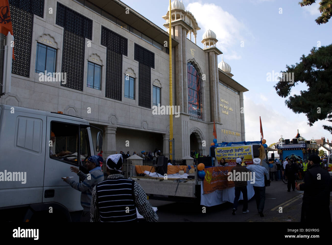 Sikh Nagar Kirtan celebration outside the Gurdwara Sri Guru Singh Sabha ...