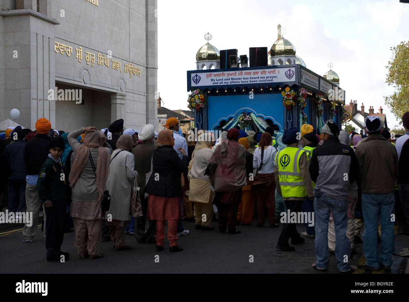 Sikh Nagar Kirtan celebration outside the Gurdwara Sri Guru Singh Sabha ...