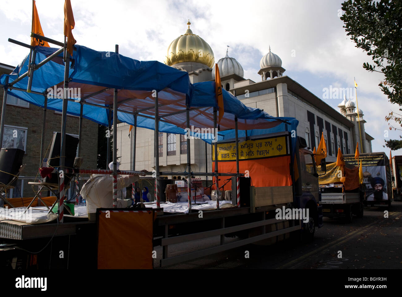 Sikh Nagar Kirtan celebration outside the Gurdwara Sri Guru Singh Sabha ...