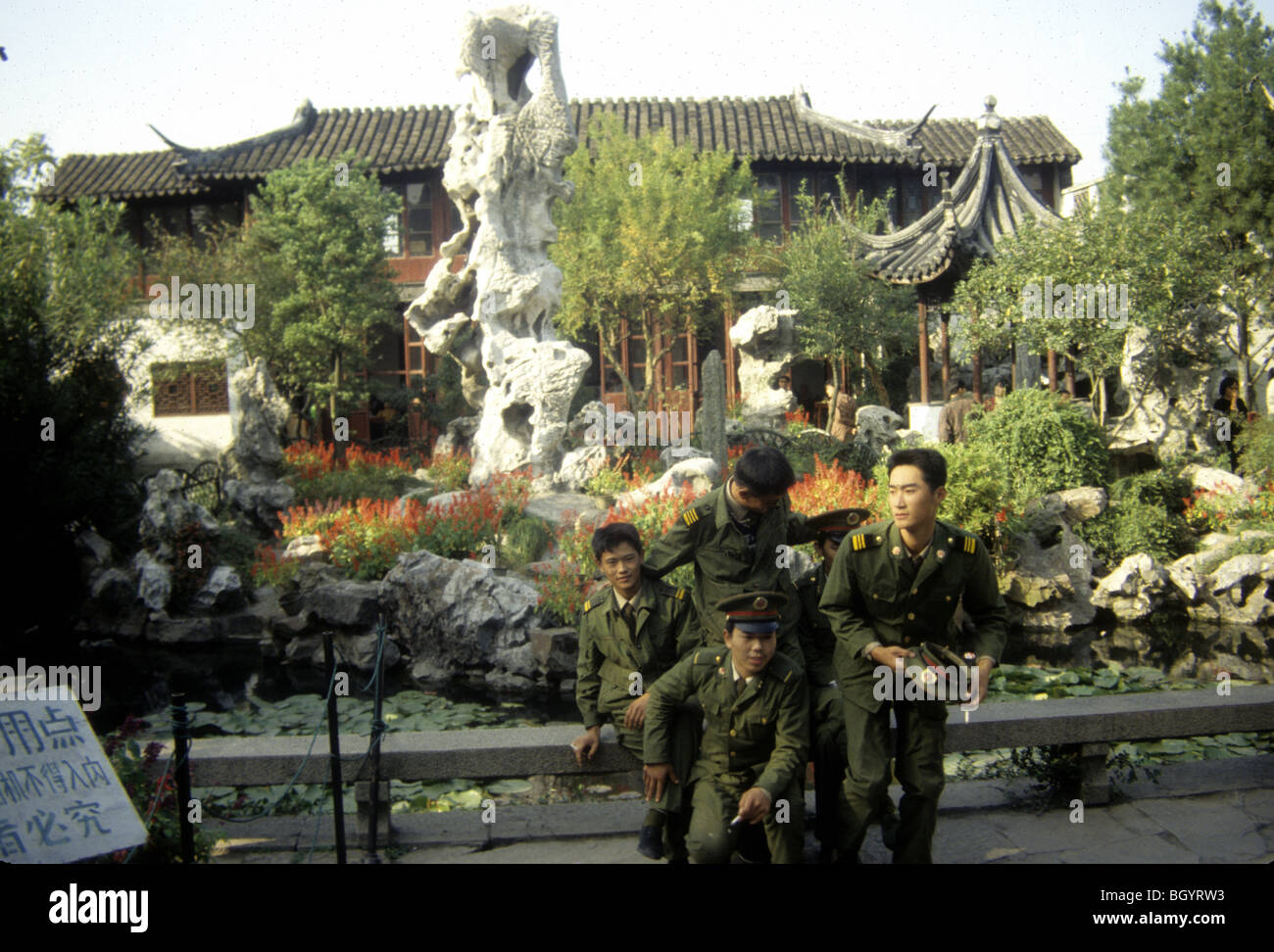 A group of Chinese soldiers pose for tourists in October 1992. travel ...