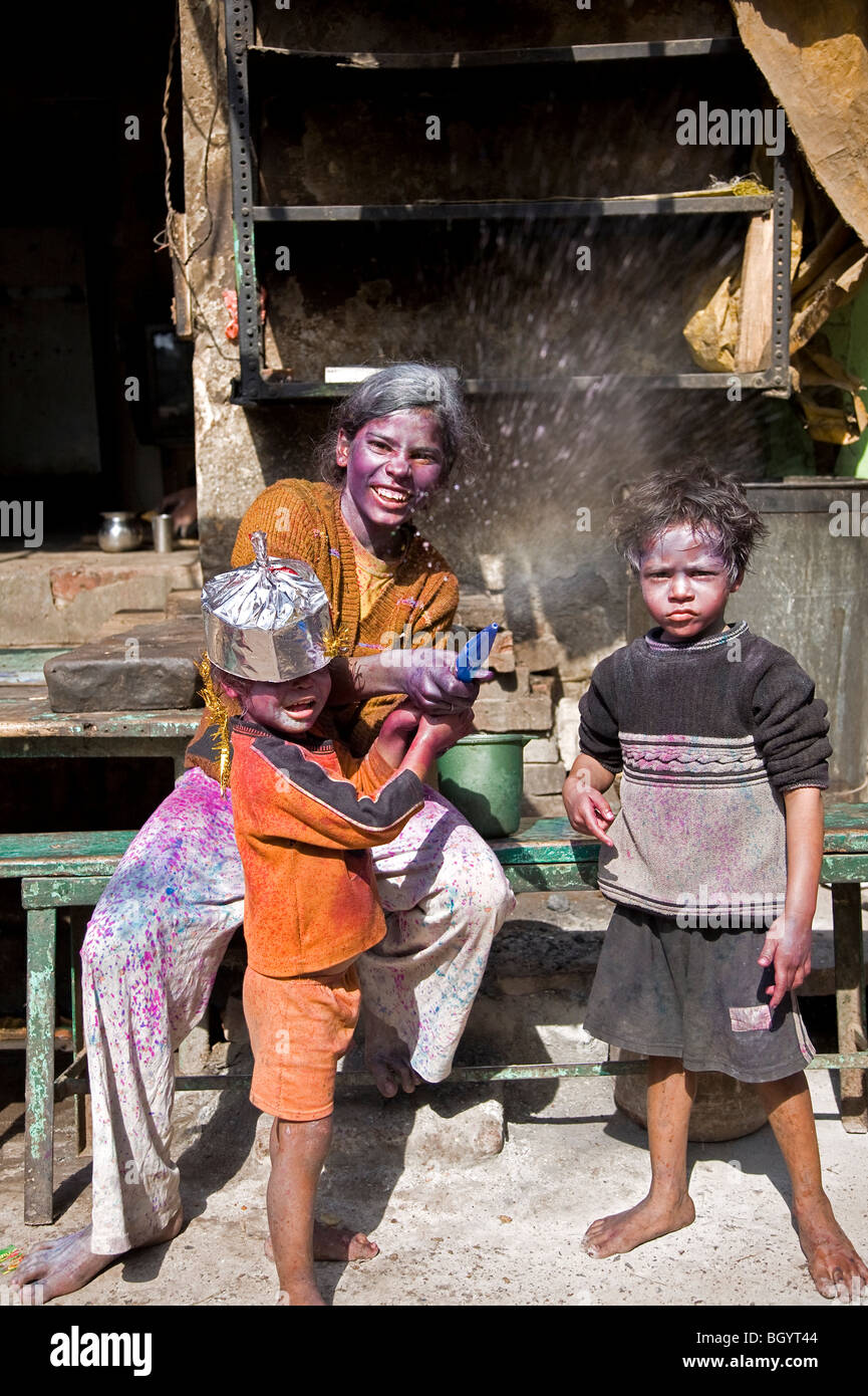 Kids playing with a water gun. Holi festival. Varanasi. India Stock ...