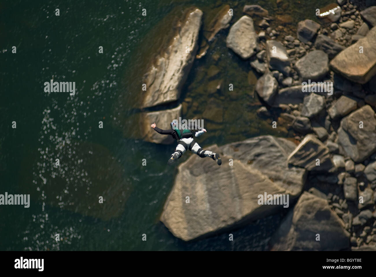 BASE jumper waits until the last minute to pull his parachute over the ...