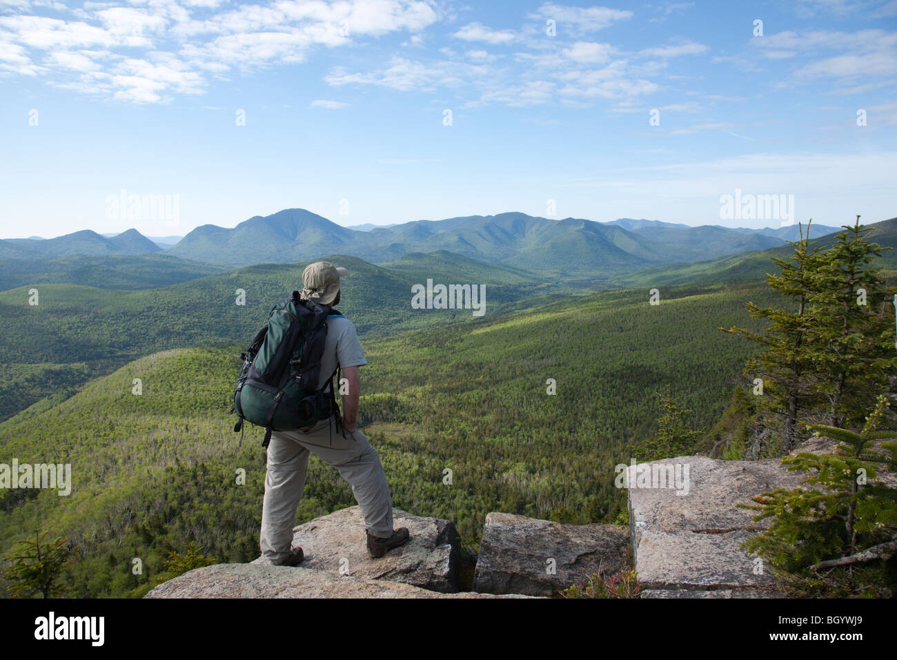 Hiker enjoys the views of Zealand Notch in the White Mountains, New ...