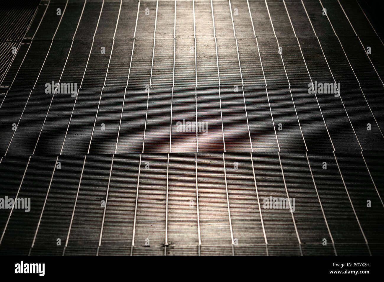 An industrial metal grid walkway background Stock Photo - Alamy