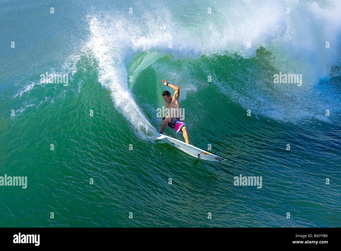 Surfer riding a barrel wave hi-res stock photography and images - Alamy