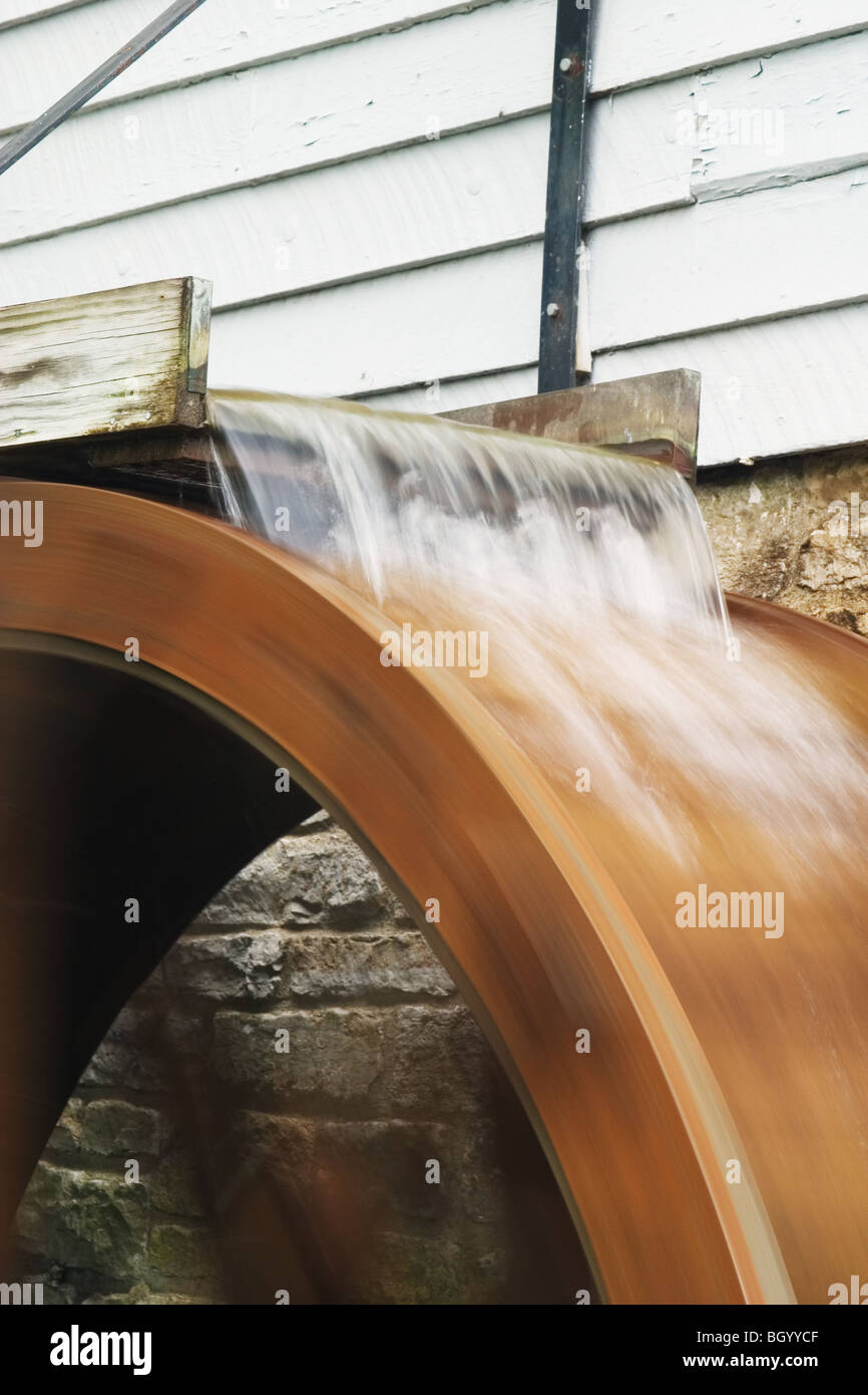 Water flowing over mill wheel Stock Photo - Alamy
