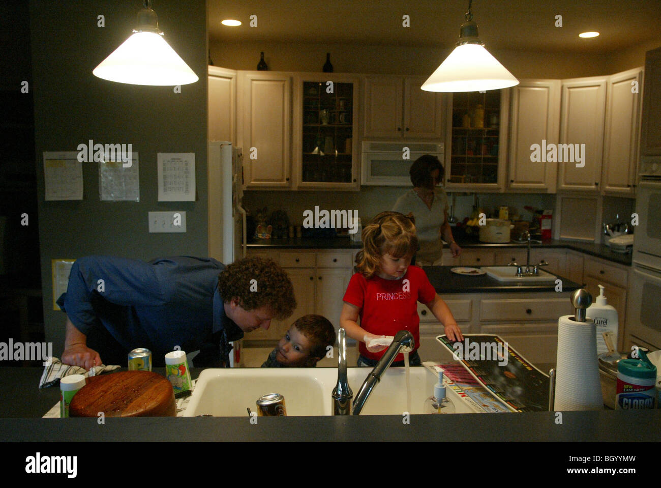 Cardiologist Greg Heumann spends time with his son Ryan Heumann while ...