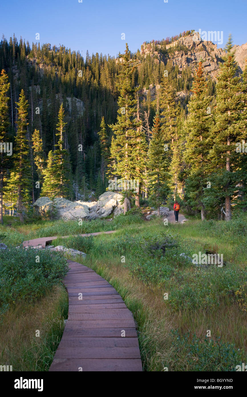 A hiker on the Dream Lake trail, Rocky Mountain National Park, Colorado ...