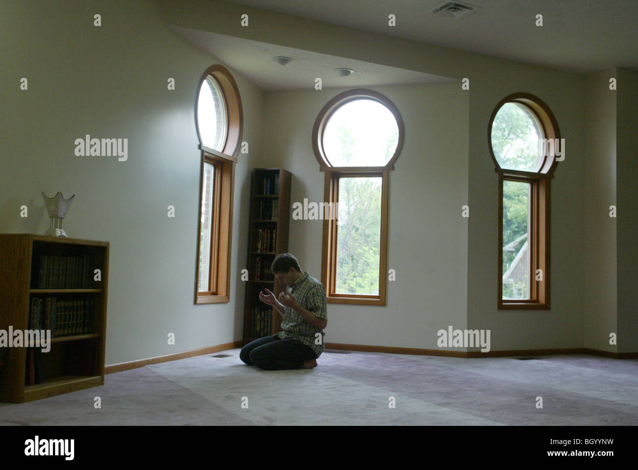 Mahmet Mayson from Turkey prays during Friday prayers at the ...