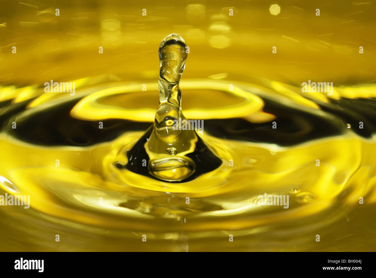 pure golden drops of water Stock Photo - Alamy