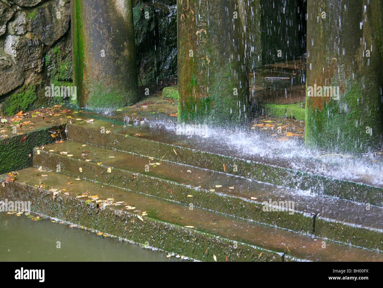 Rain and porch with pillars and steps (waterfall composition in old ...
