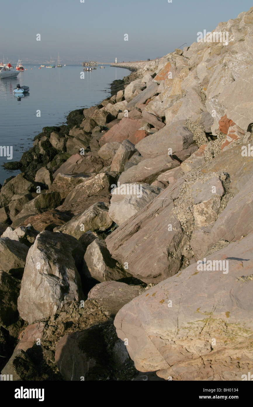 The Brixham harbour sea wall, Devon UK Stock Photo - Alamy