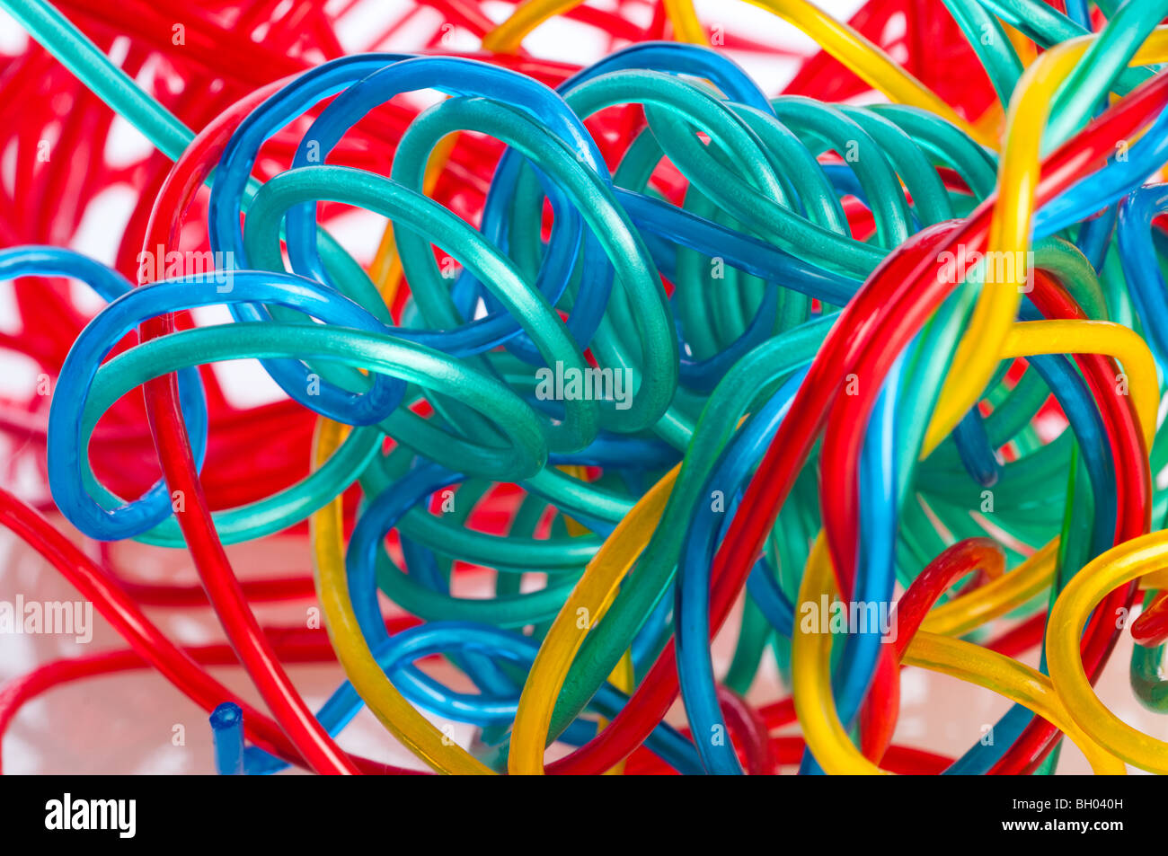 Multicolored computer cable isolated on white Stock Photo - Alamy