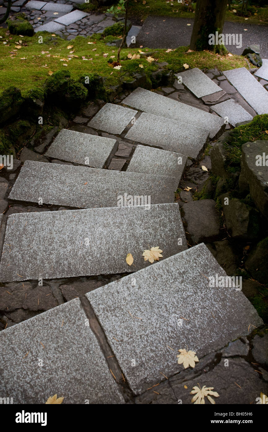 Garden path with glowing steps going down Stock Photo - Alamy