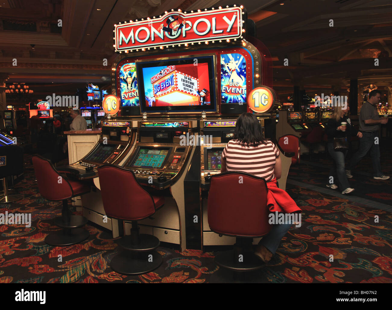 People playing gambling machines in hi-res stock photography and images ...