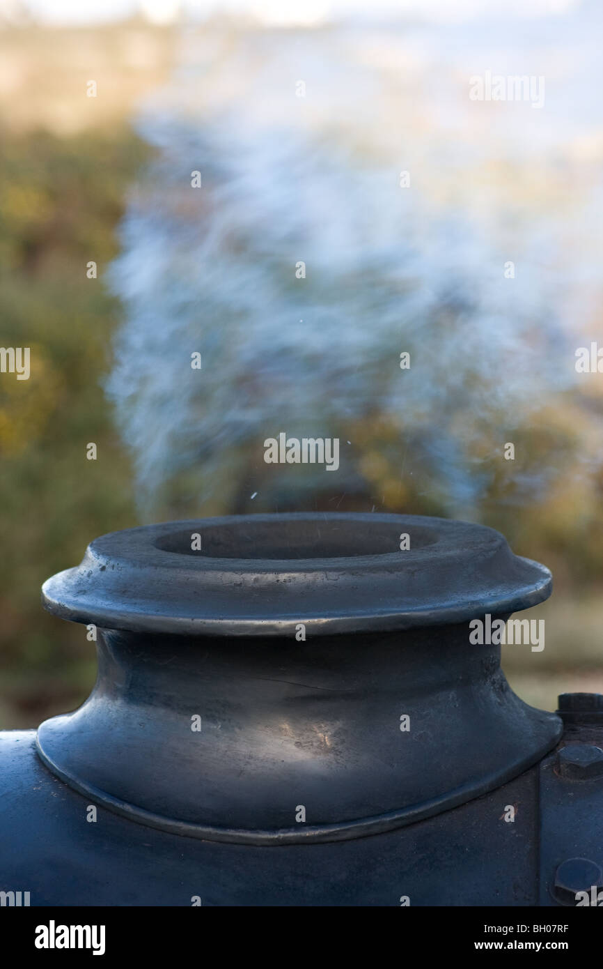 miniature steam railway train valve funnel classic Stock Photo - Alamy