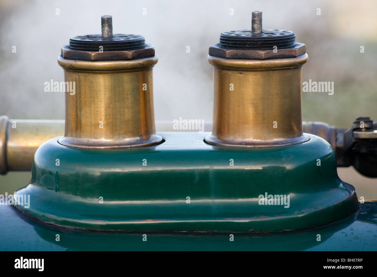 miniature steam railway train valve funnel classic Stock Photo - Alamy