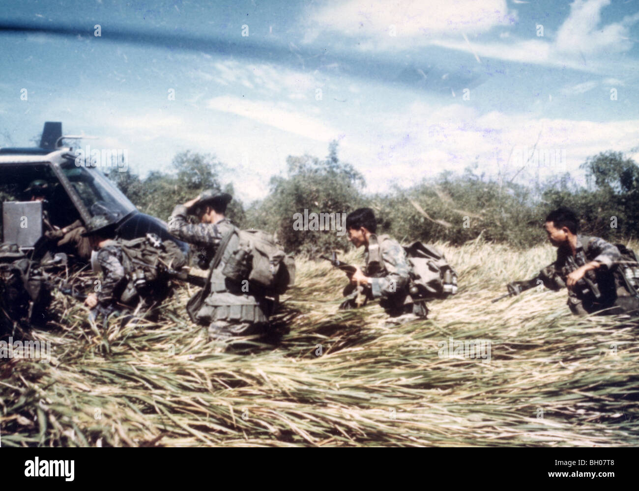 ARVN (Army Republic of Vietnam) soldiers board a U.S. Army UH-1D ...