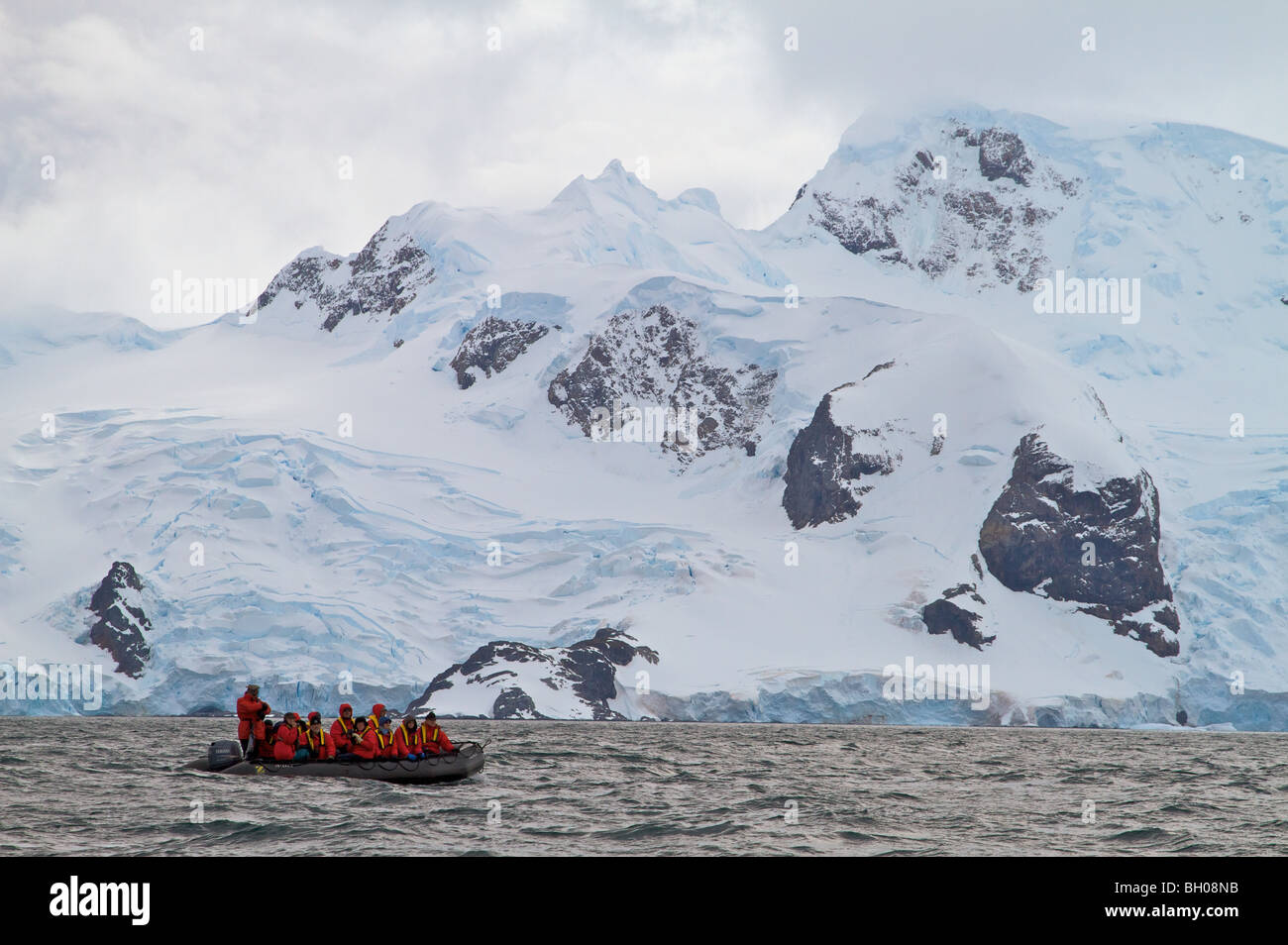 Zodiac landing party leaving the Clelia II in Antarctica Stock Photo ...