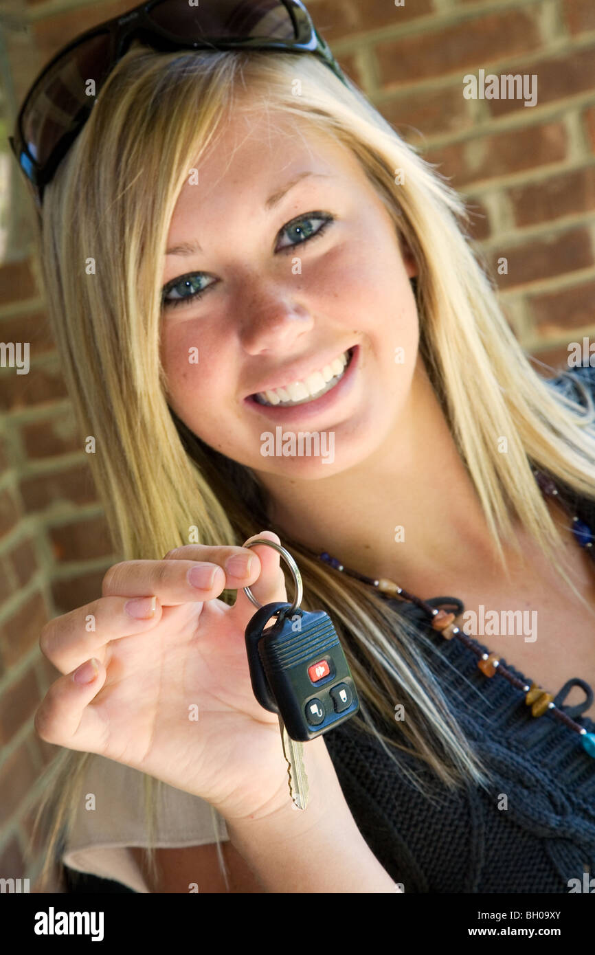 Happy teenager girl keys hi-res stock photography and images - Alamy