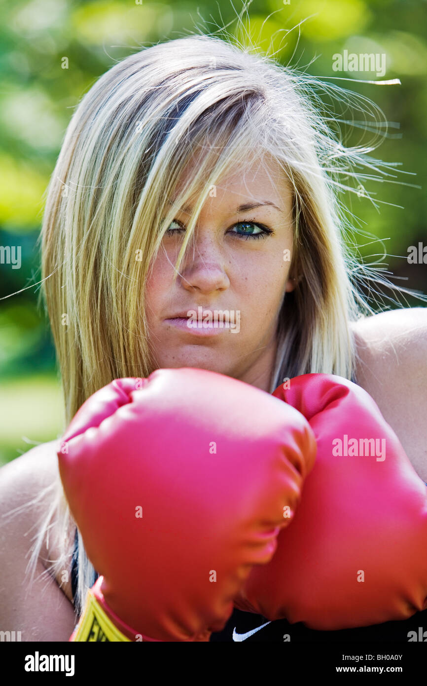 Teenage girl in boxing gloves Stock Photo - Alamy
