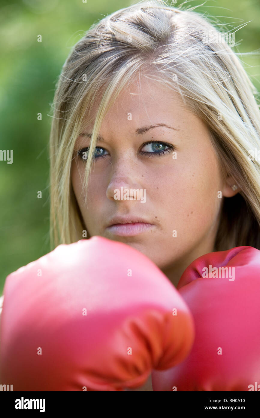 Teenage girl in boxing gloves Stock Photo - Alamy