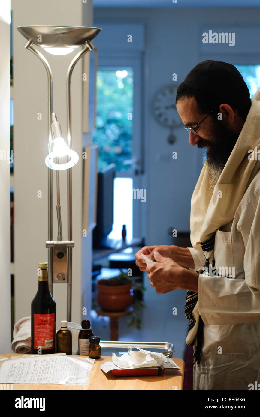 Circumcision - Brit Mila Ceremony The Mohel performs the rite Stock ...