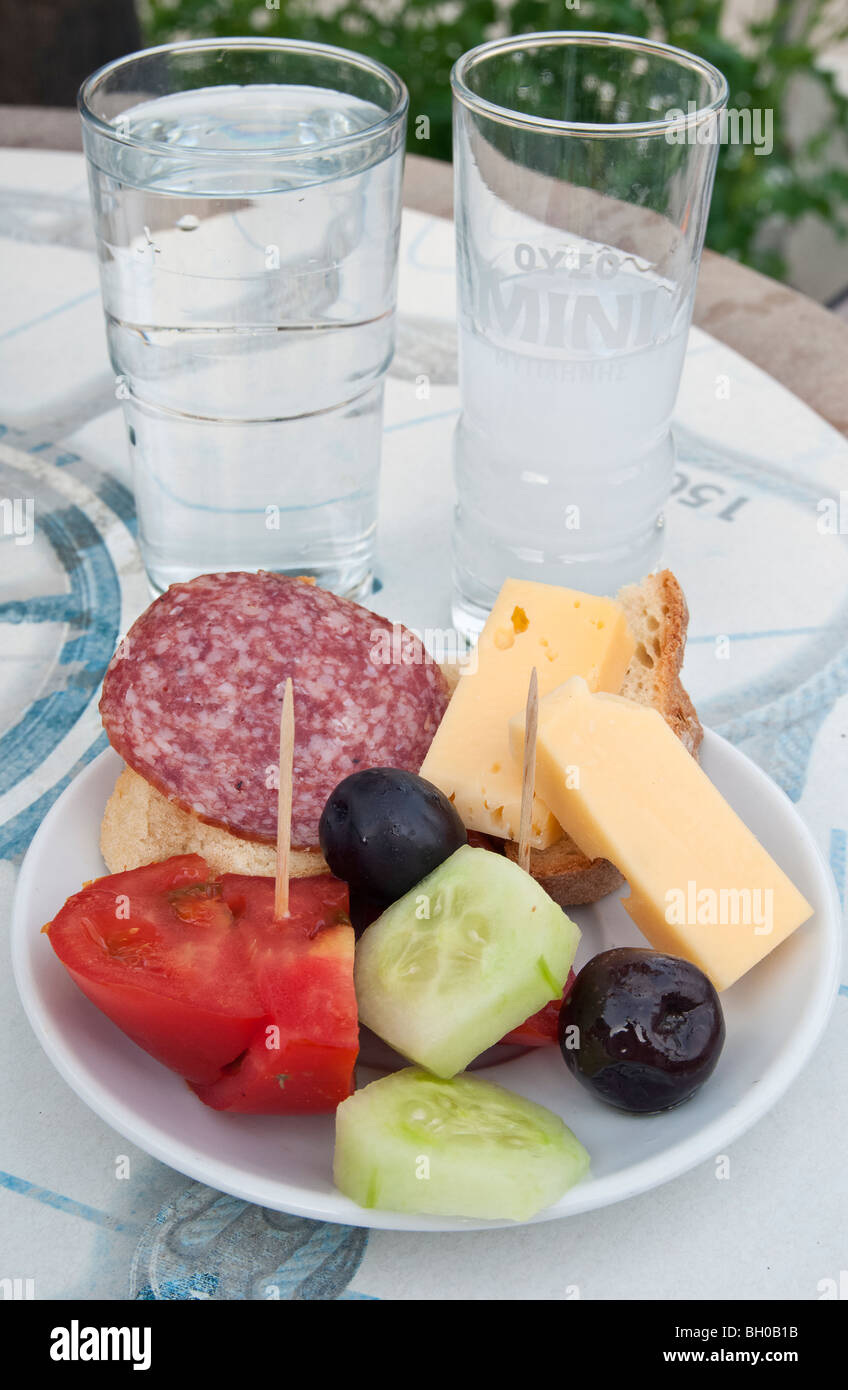 Ouzo and meze plate in Greece Stock Photo - Alamy