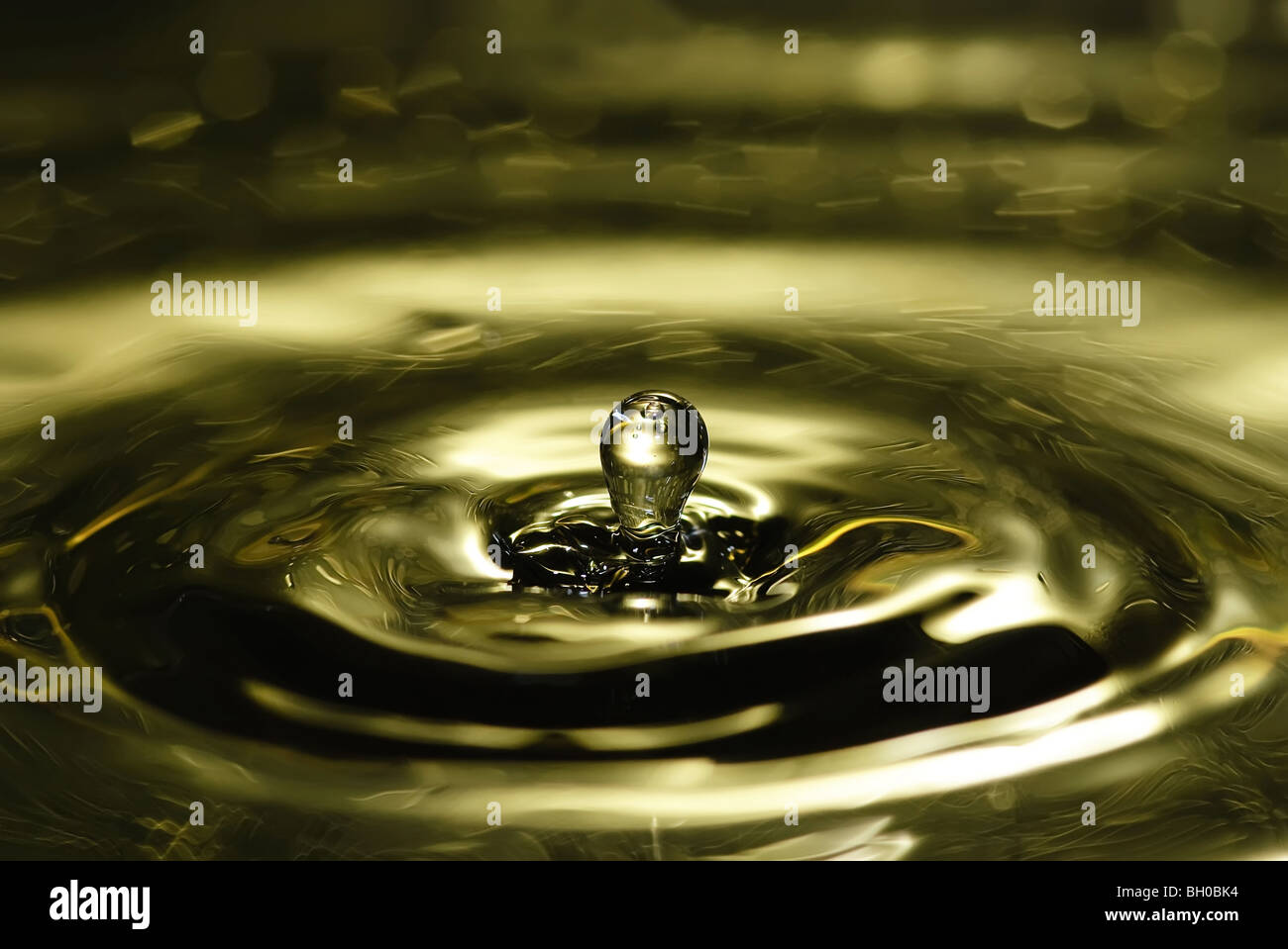 pure golden drops of water Stock Photo - Alamy