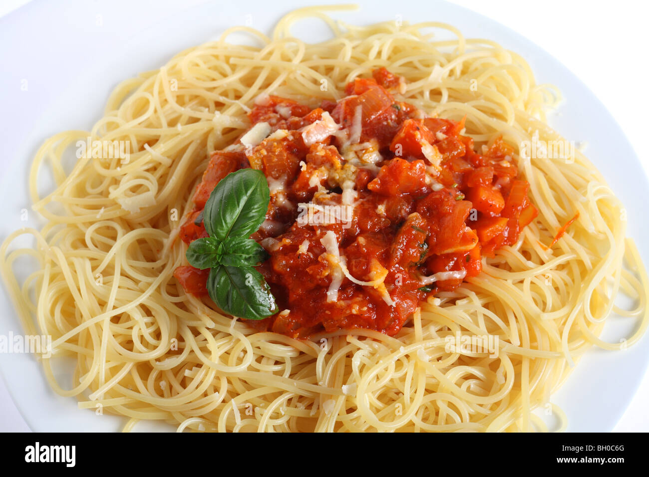Close-up vertical view of Spaghetti al Pomodoro - spaghetti with tomato ...