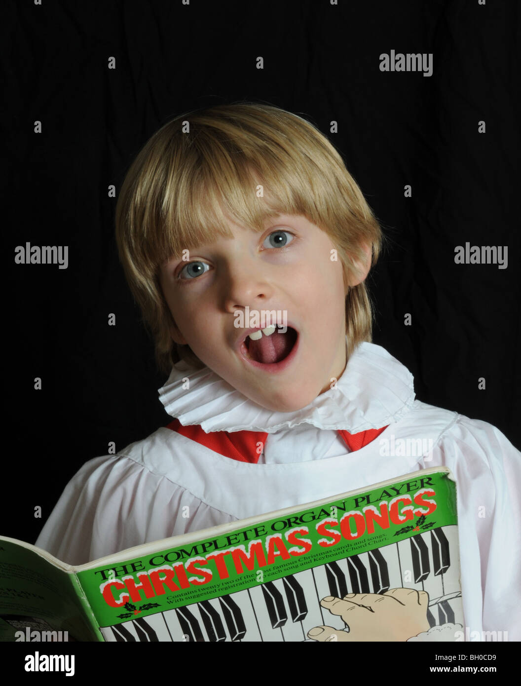 Young choir boy, chorister singing Christmas carols Stock Photo - Alamy