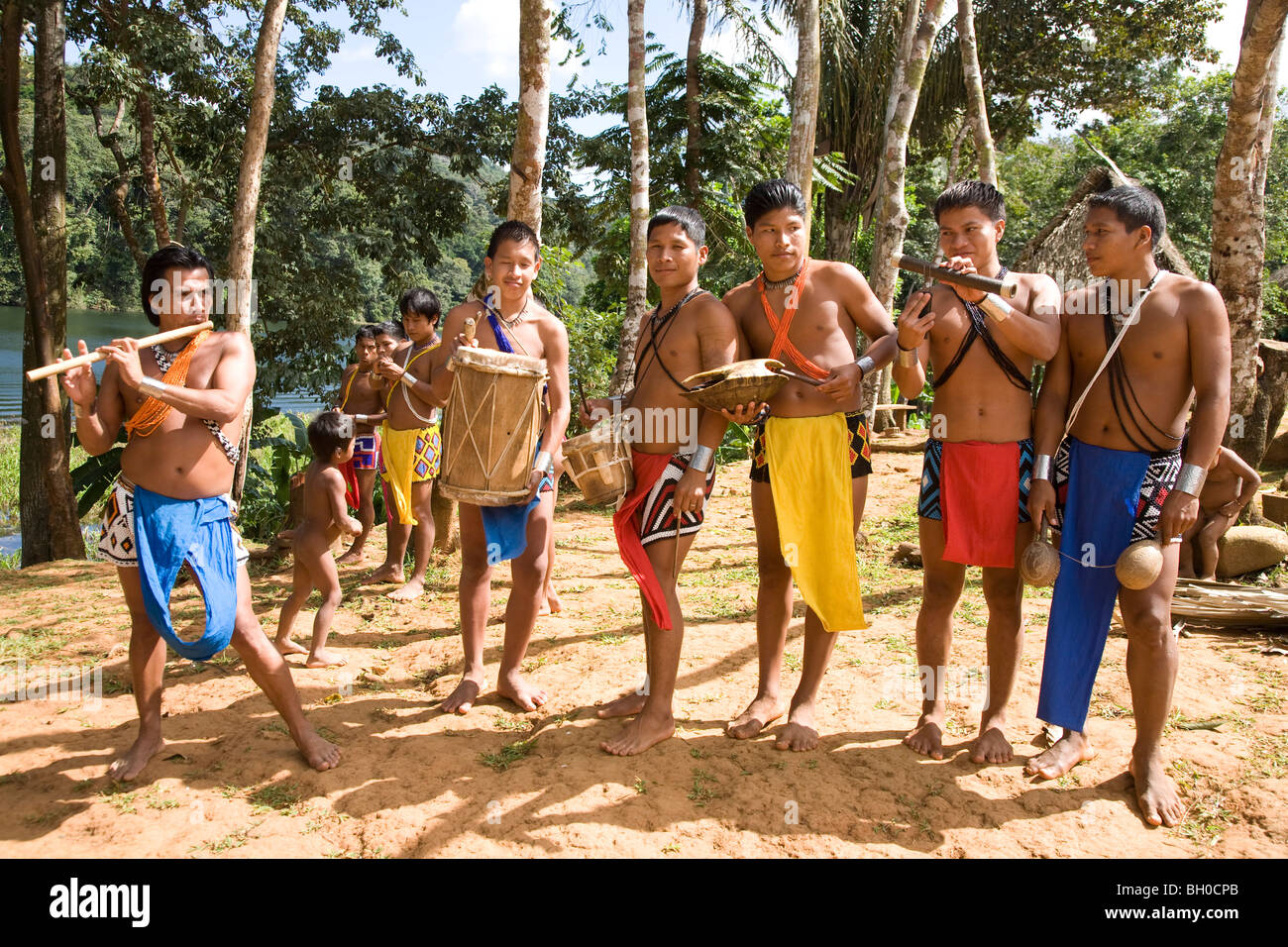 Young men playing musical instruments. Embera Indian Village. Chagres ...