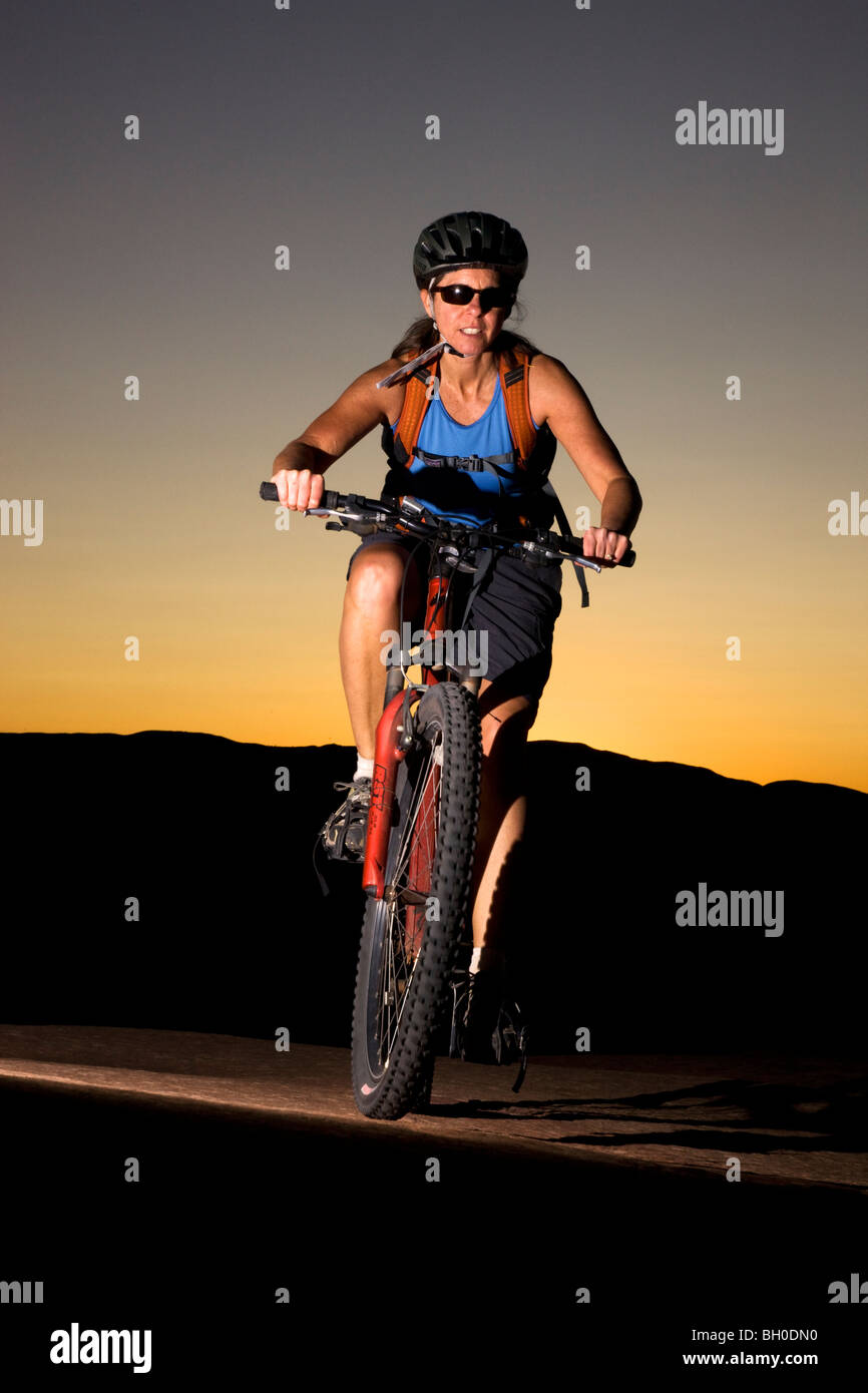 Mountain biking the famous Slickrock Trail, Moab, Utah. (model released ...