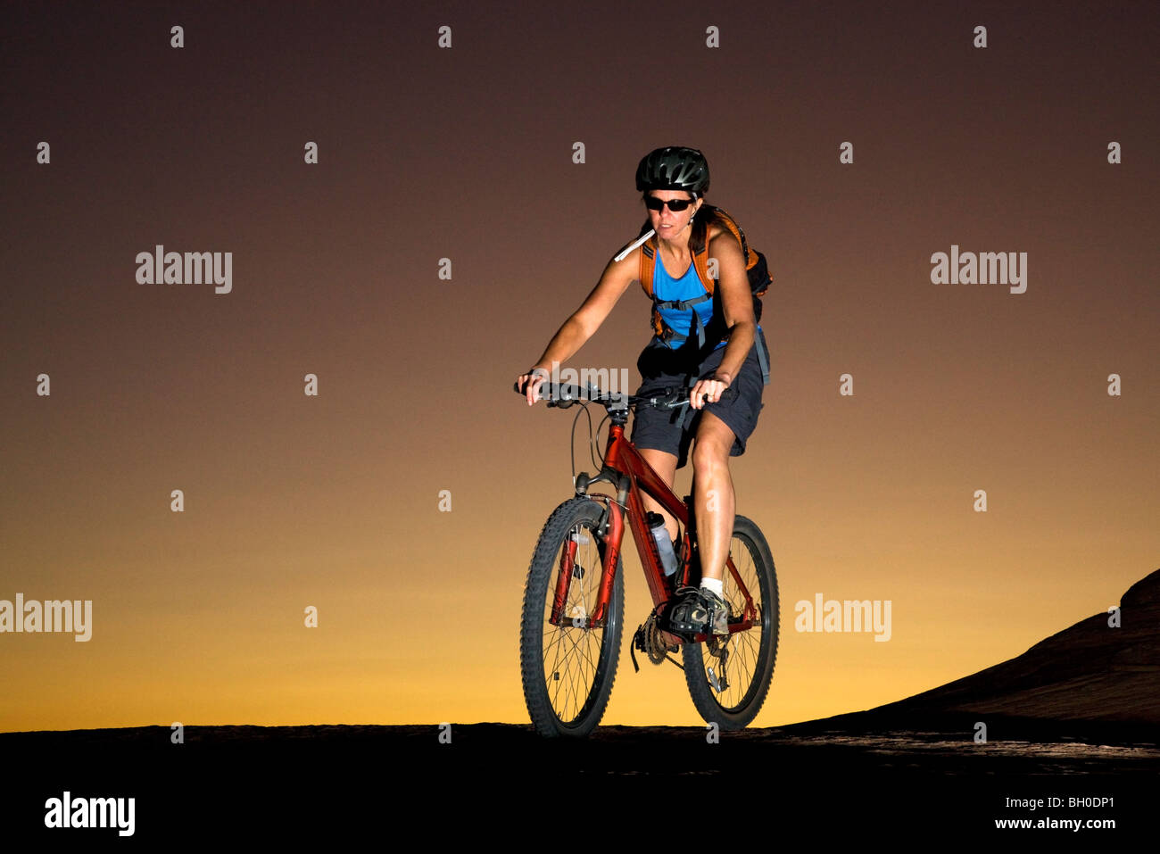 Mountain biking the famous Slickrock Trail, Moab, Utah. (model released ...