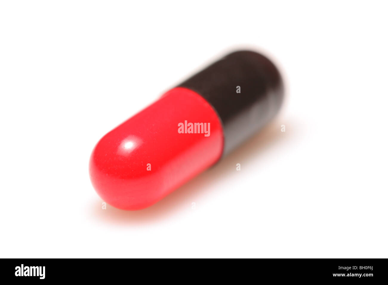 Capsule isolated on white background Stock Photo - Alamy