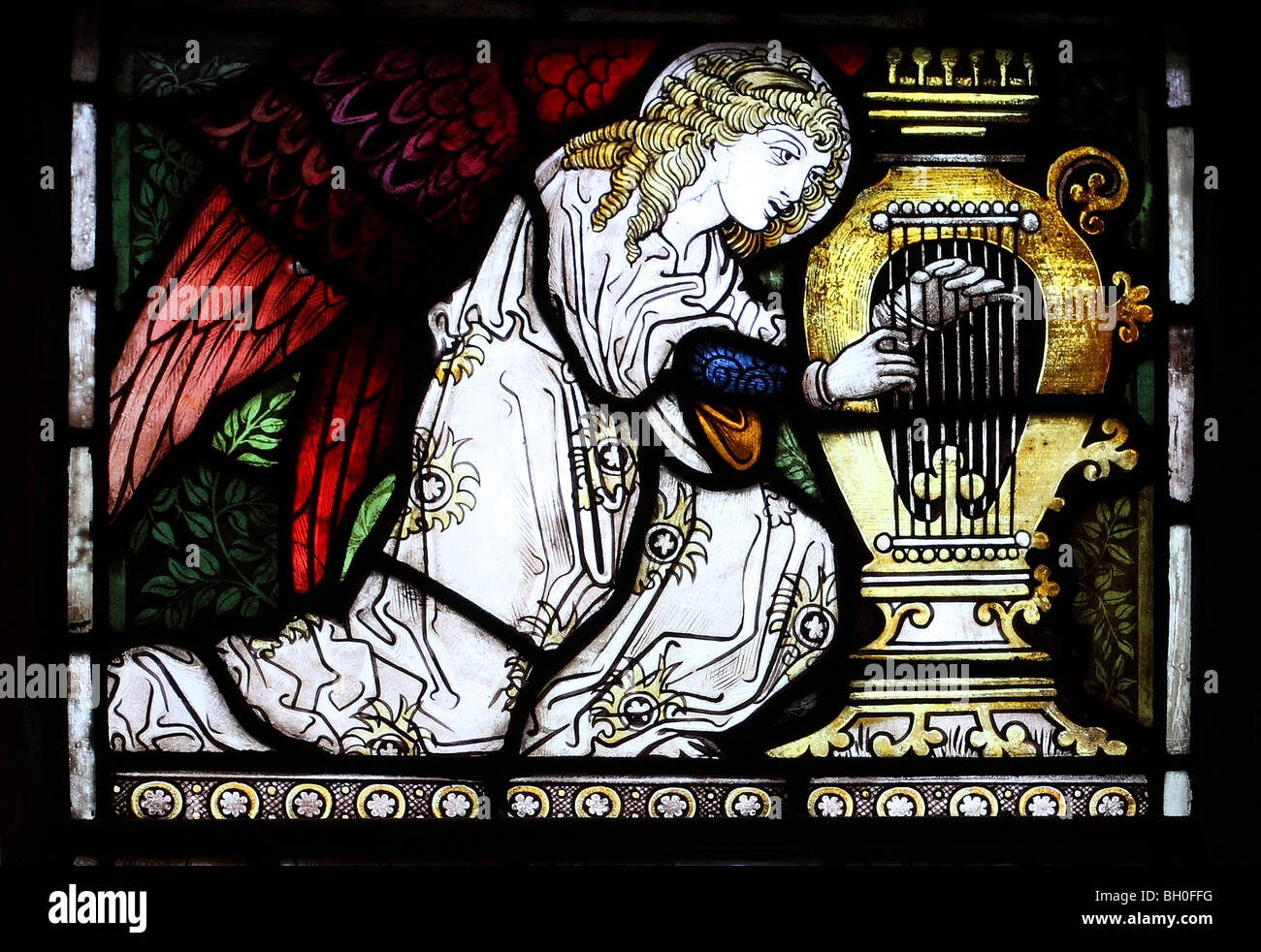 Stained glass music musician harp hi-res stock photography and images ...