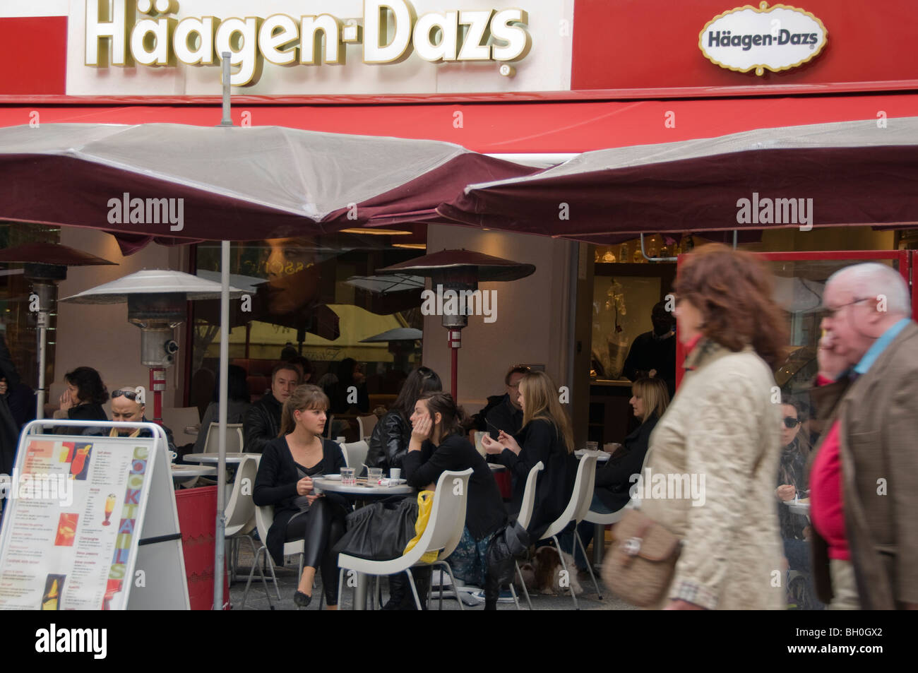 People sharing snacks terrace foreign foreigner hi-res stock ...