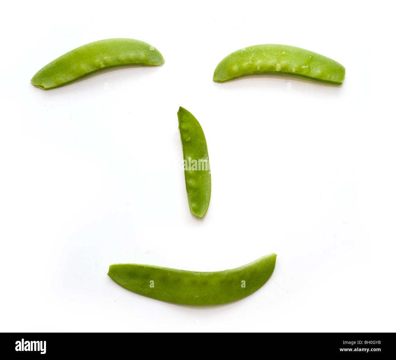 Snap Peas smile face isolated on White Stock Photo - Alamy
